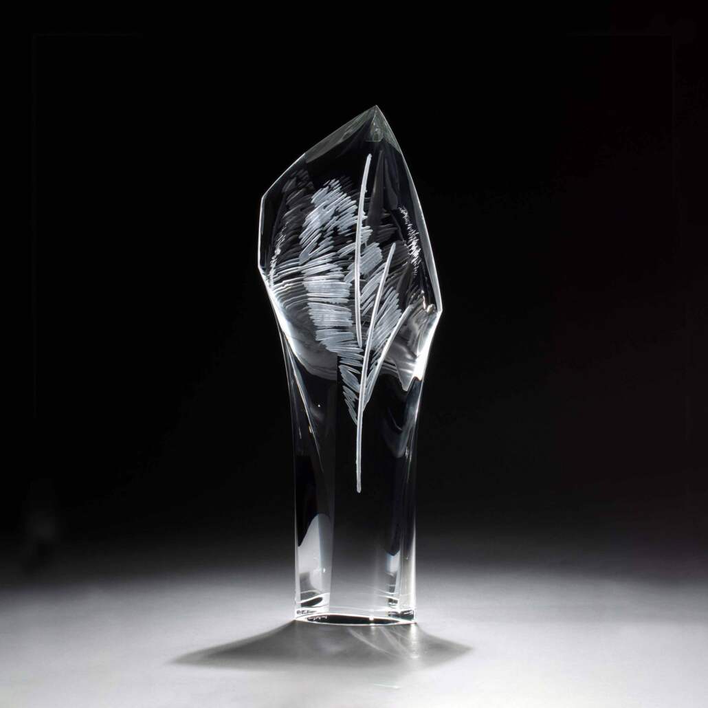 Pure clear glass sculpture with floating calligraphic carved marking